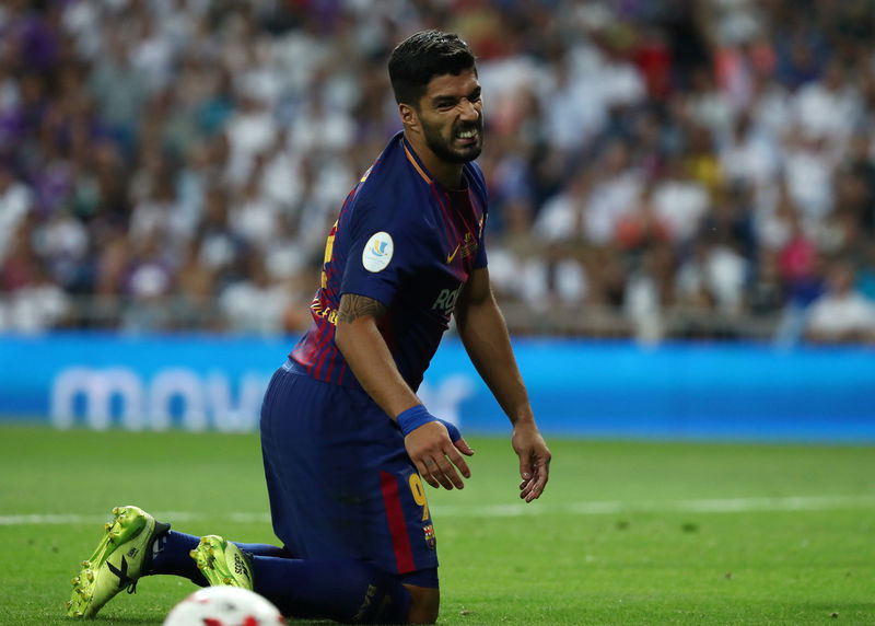 Barca problems mount with Suarez and Pique injuries By Reuters