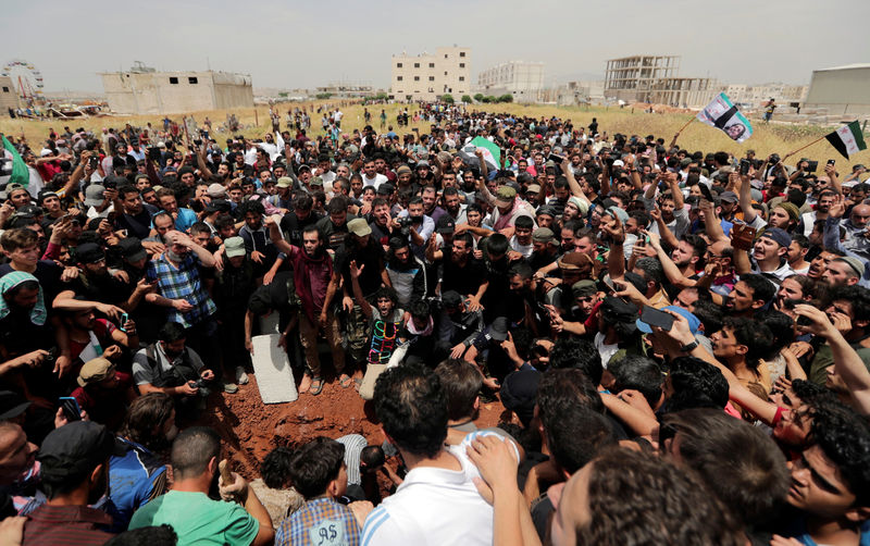 Syrian rebel town buries goalie who became 'singer of the revolution ...