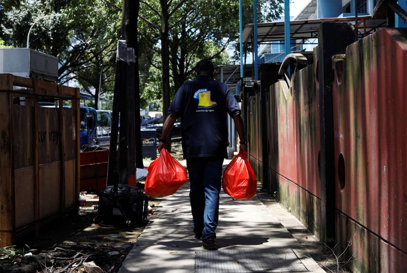 Pastor helps keep Singapore's migrant workers fed during COVID-19 ...