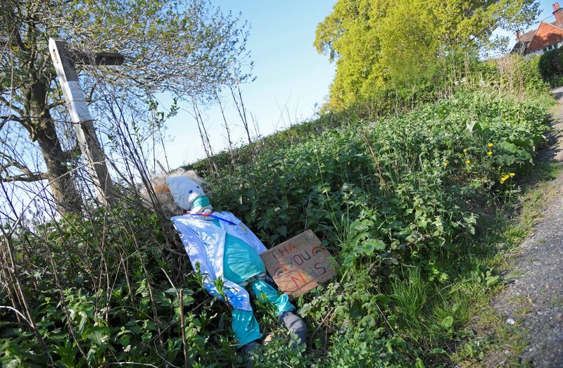 Lockdown walks brightened by key worker scarecrows in English village ...